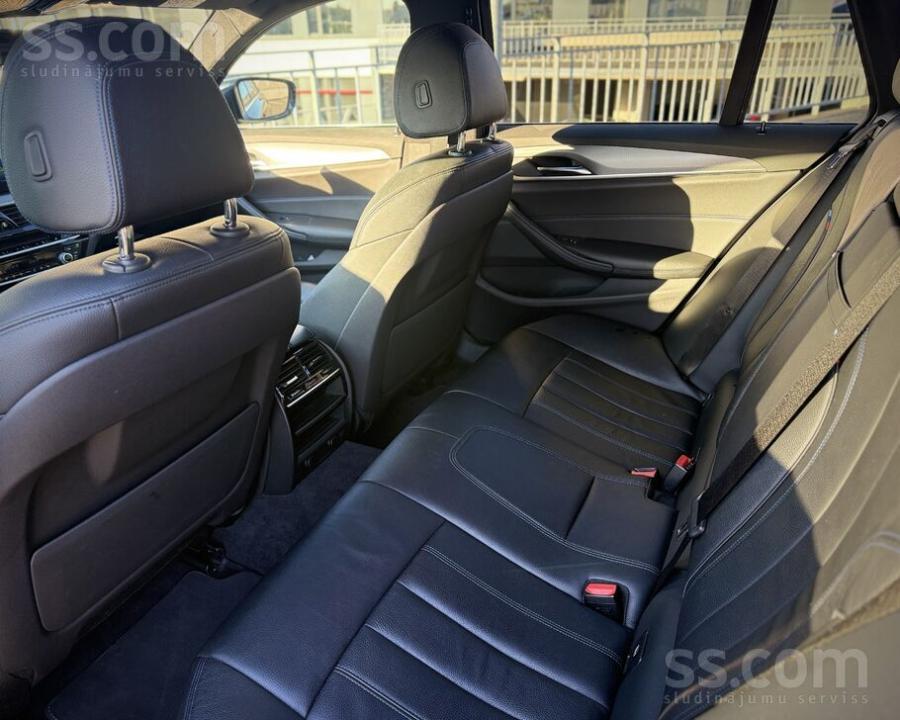 Black BMW 520 2018 in Riga, with an engine capacity of 2.00 L and mileage of 252 thousand km for 16450 €, photo 15 on AUTOMOTO.COM.LV
