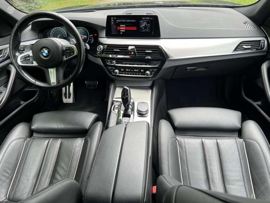 Black BMW 520 2018 in Kaunas, with an engine capacity of 2.00 L and mileage of 200 thousand km for 18750 €, photo 12 on AUTOMOTO.COM.LV