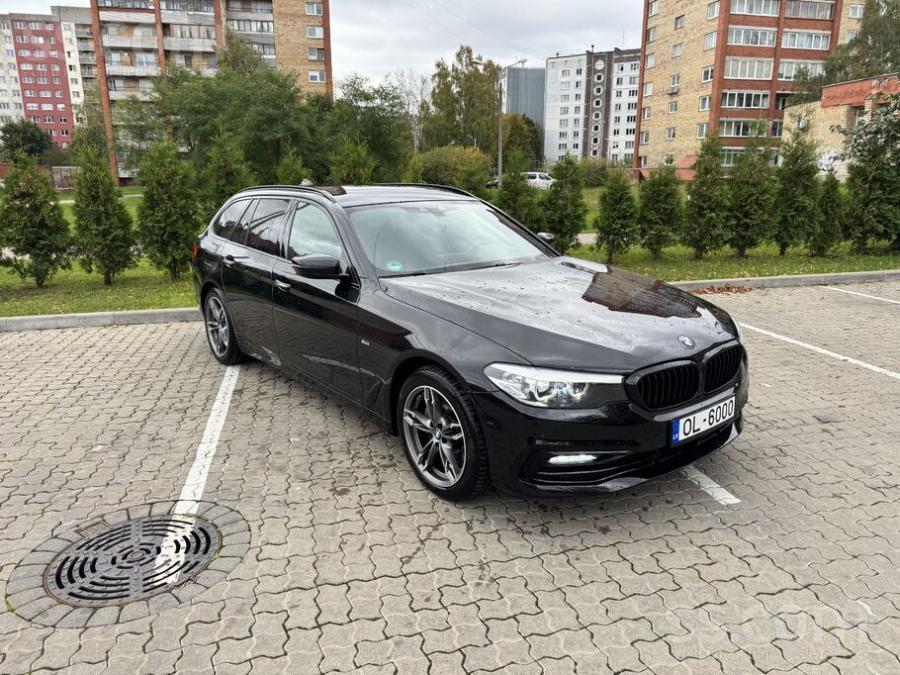Black BMW 520 2018 in Riga, with an engine capacity of 2.00 L and mileage of 194 thousand km for 15700 €, photo 1 on AUTOMOTO.COM.LV