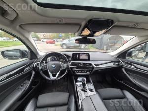 Black BMW 520 2018 in Riga, with an engine capacity of 2.00 L and mileage of 207 thousand km for 17990 €, photo 13 on AUTOMOTO.COM.LV