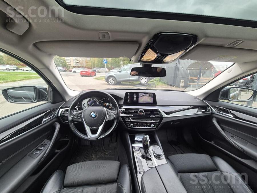 Black BMW 520 2018 in Riga, with an engine capacity of 2.00 L and mileage of 207 thousand km for 17990 €, photo 13 on AUTOMOTO.COM.LV