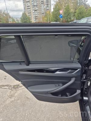 Black BMW 520 2018 in Riga, with an engine capacity of 2.00 L and mileage of 207 thousand km for 17990 €, photo 15 on AUTOMOTO.COM.LV