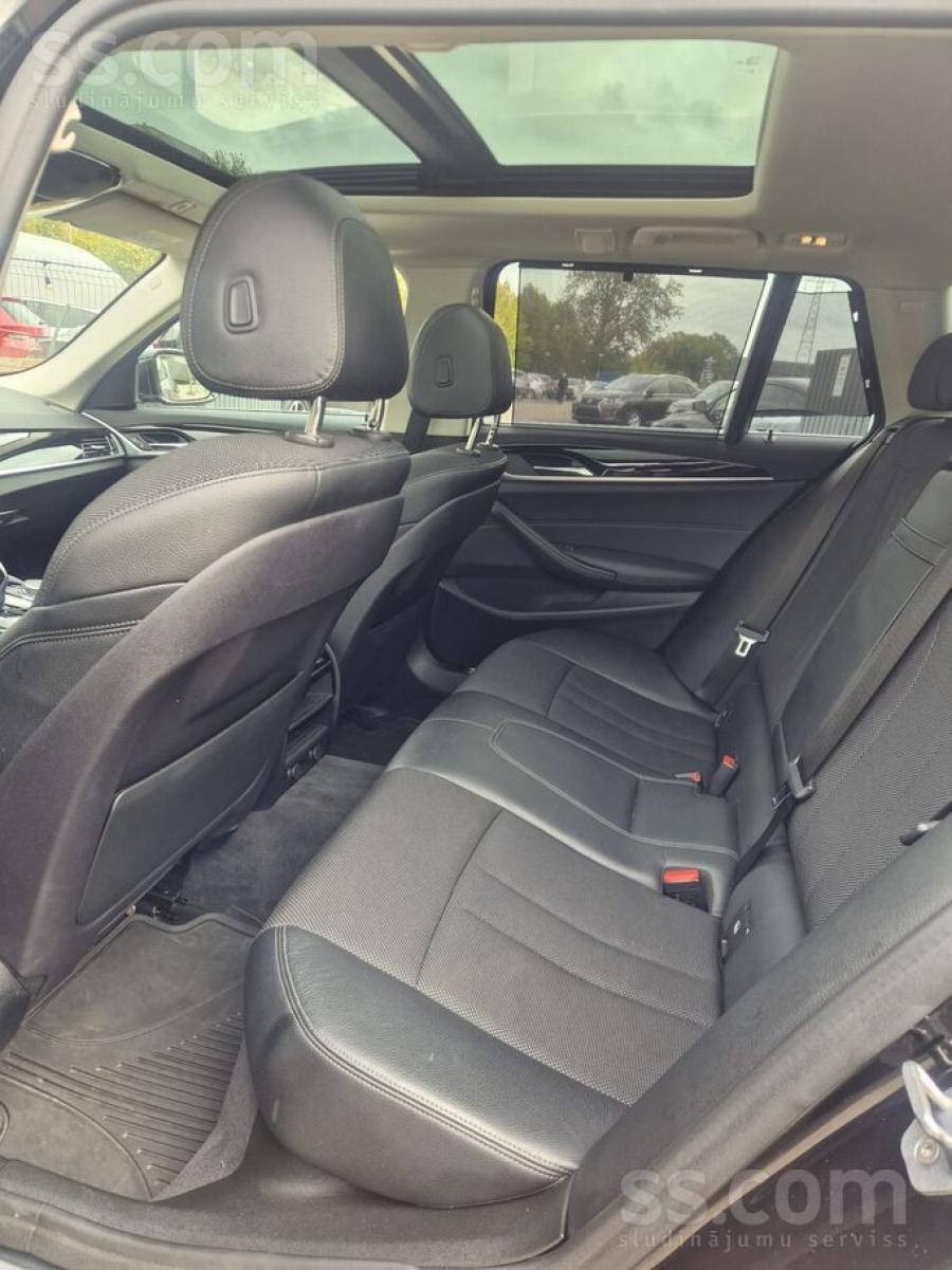 Black BMW 520 2018 in Riga, with an engine capacity of 2.00 L and mileage of 207 thousand km for 17990 €, photo 17 on AUTOMOTO.COM.LV