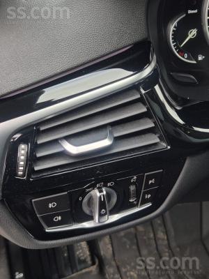 Black BMW 520 2018 in Riga, with an engine capacity of 2.00 L and mileage of 207 thousand km for 17990 €, photo 18 on AUTOMOTO.COM.LV