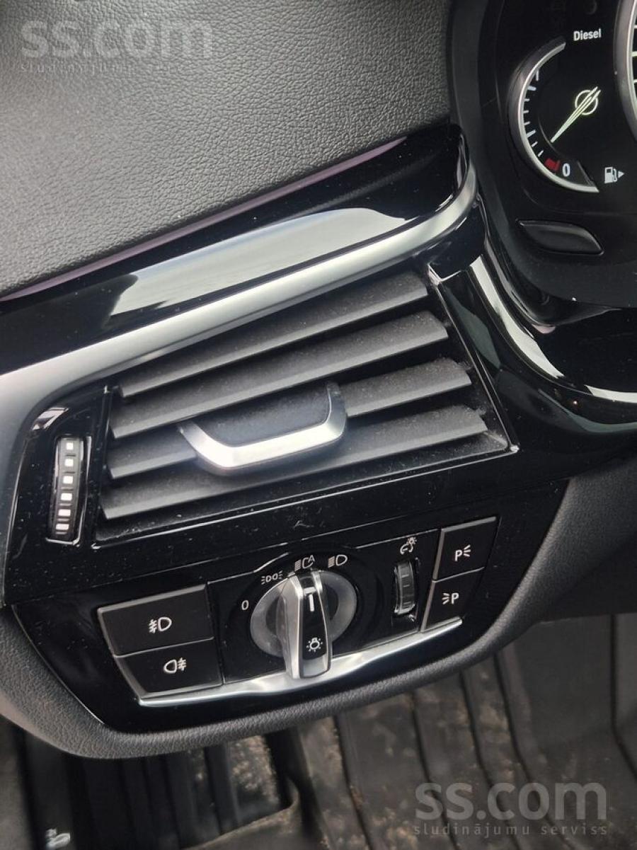 Black BMW 520 2018 in Riga, with an engine capacity of 2.00 L and mileage of 207 thousand km for 17990 €, photo 18 on AUTOMOTO.COM.LV