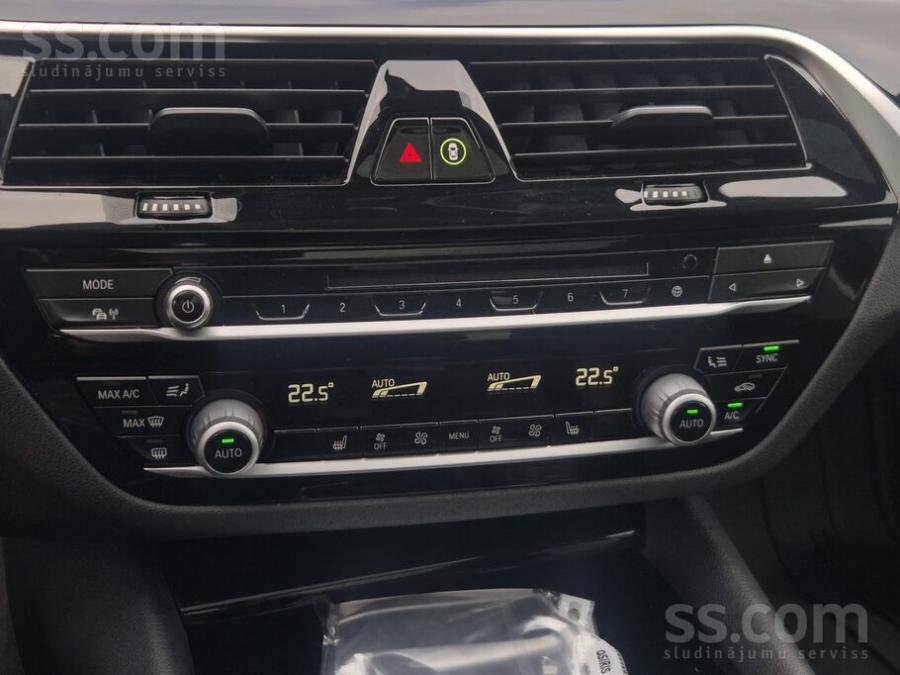 Black BMW 520 2018 in Riga, with an engine capacity of 2.00 L and mileage of 207 thousand km for 17990 €, photo 20 on AUTOMOTO.COM.LV