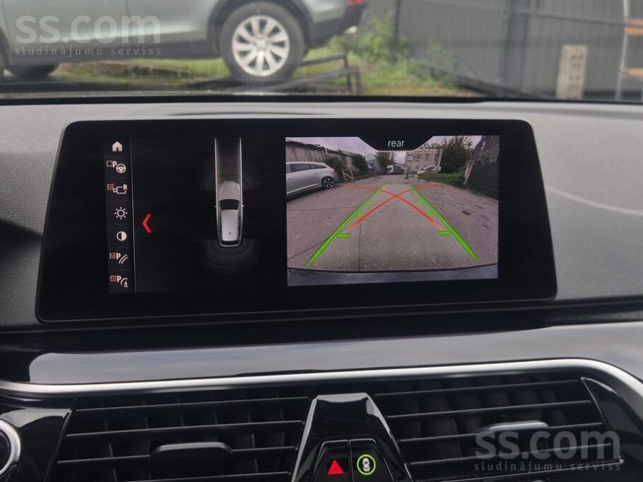 Black BMW 520 2018 in Riga, with an engine capacity of 2.00 L and mileage of 207 thousand km for 17990 €, photo 21 on AUTOMOTO.COM.LV