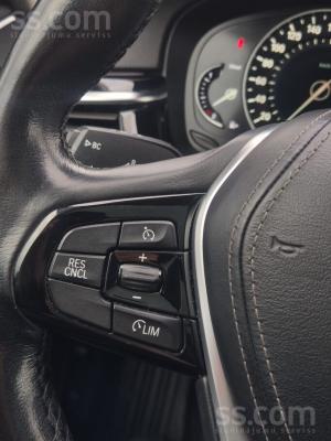 Black BMW 520 2018 in Riga, with an engine capacity of 2.00 L and mileage of 207 thousand km for 17990 €, photo 23 on AUTOMOTO.COM.LV