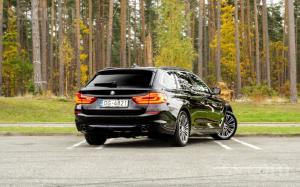 Black BMW 520 2018 in Riga, with an engine capacity of 2.00 L and mileage of 207 thousand km for 17990 €, photo 7 on AUTOMOTO.COM.LV