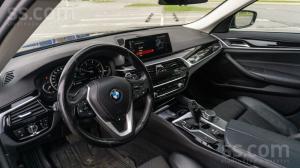Black BMW 520 2018 in Riga, with an engine capacity of 2.00 L and mileage of 207 thousand km for 17990 €, photo 11 on AUTOMOTO.COM.LV