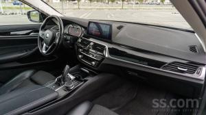 Black BMW 520 2018 in Riga, with an engine capacity of 2.00 L and mileage of 207 thousand km for 17990 €, photo 12 on AUTOMOTO.COM.LV