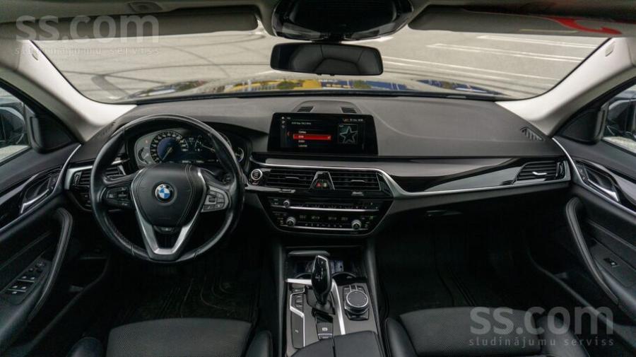 Black BMW 520 2018 in Riga, with an engine capacity of 2.00 L and mileage of 207 thousand km for 17990 €, photo 13 on AUTOMOTO.COM.LV