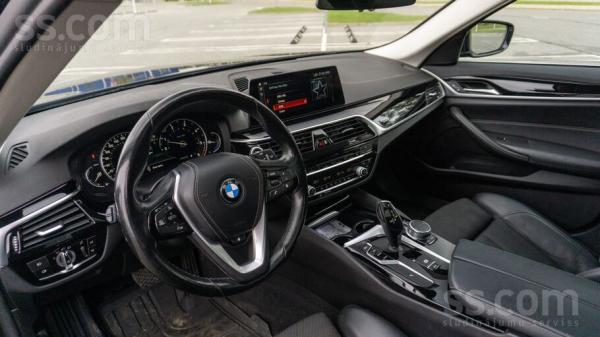 Black BMW 520 2018 in Riga, with an engine capacity of 2.00 L and mileage of 207 thousand km for 17990 €, photo 11 on AUTOMOTO.COM.LV