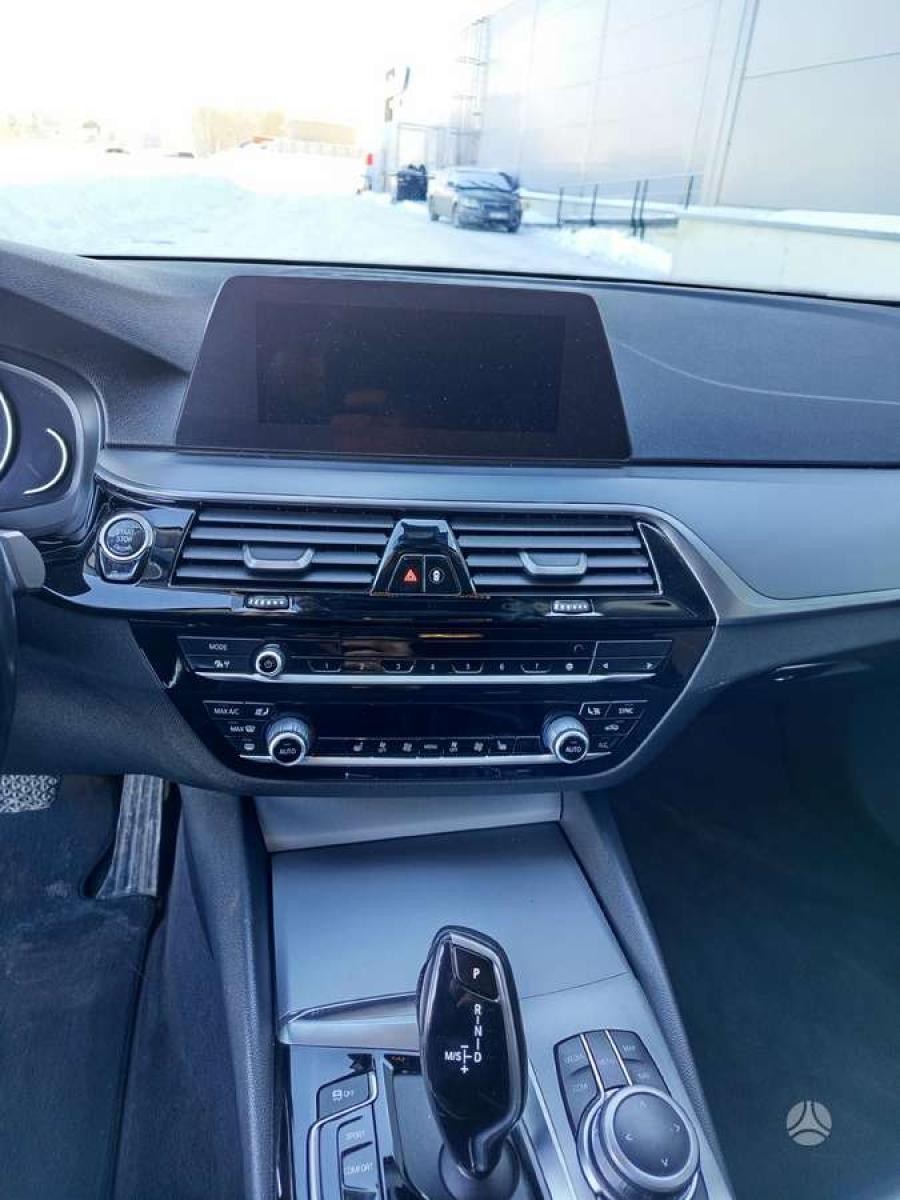 Black BMW 520 2019 in Siauliai, with an engine capacity of 2.00 L and mileage of 177 thousand km for 16900 €, photo 16 on AUTOMOTO.COM.LV