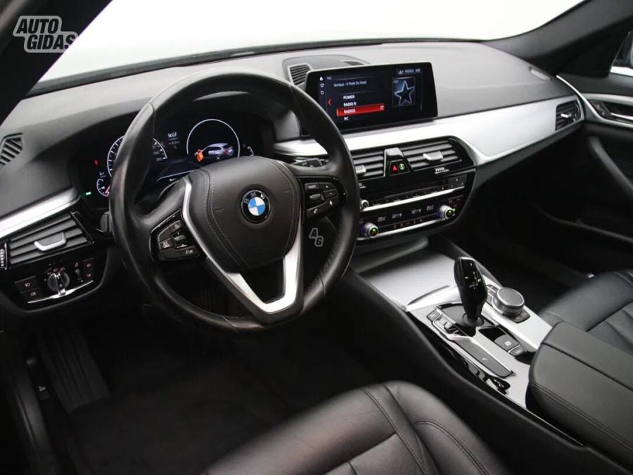 Black BMW 520 2019 in Vilnius, with an engine capacity of 2.00 L and mileage of 146 thousand km for 20999 €, photo 17 on AUTOMOTO.COM.LV