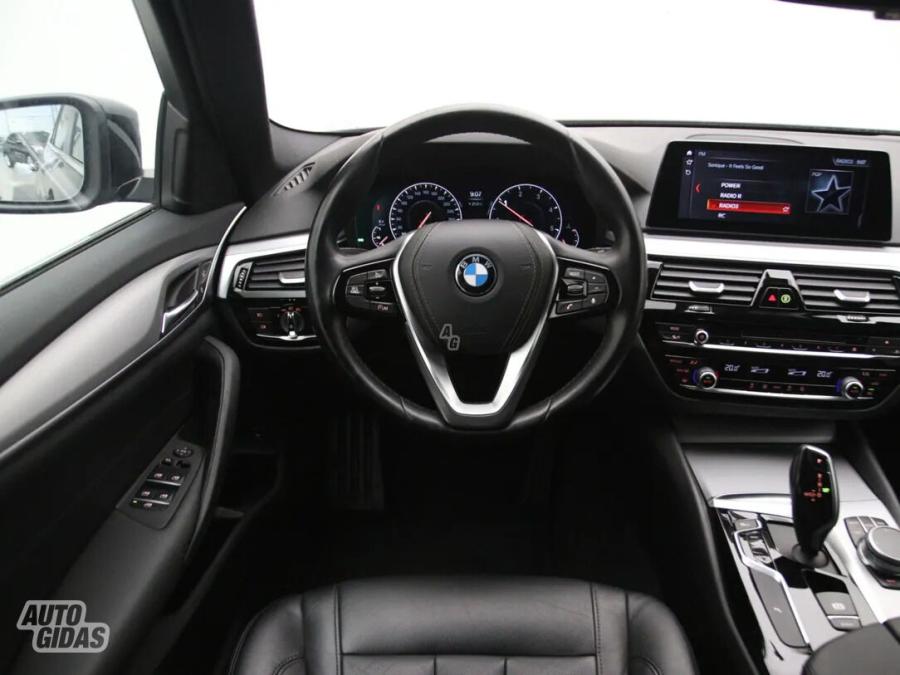 Black BMW 520 2019 in Vilnius, with an engine capacity of 2.00 L and mileage of 146 thousand km for 20999 €, photo 18 on AUTOMOTO.COM.LV