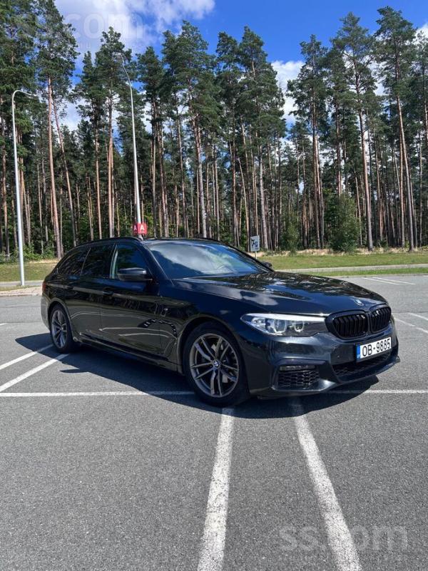 Black BMW 520 2019 in Riga, with an engine capacity of 2.00 L and mileage of 237 thousand km for 17499 €, photo 1 on AUTOMOTO.COM.LV