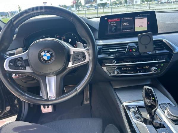 Black BMW 520 2019 in Riga, with an engine capacity of 2.00 L and mileage of 237 thousand km for 17499 €, photo 10 on AUTOMOTO.COM.LV