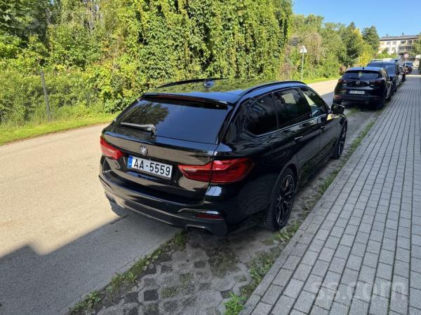 Black BMW 520 2019 in Riga, with an engine capacity of 2.00 L and mileage of 119 thousand km for 26500 €, photo 3 on AUTOMOTO.COM.LV