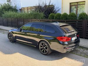 Black BMW 520 2019 in Riga, with an engine capacity of 2.00 L and mileage of 119 thousand km for 26500 €, photo 5 on AUTOMOTO.COM.LV