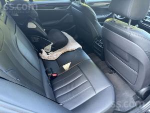 Black BMW 520 2019 in Riga, with an engine capacity of 2.00 L and mileage of 119 thousand km for 26500 €, photo 13 on AUTOMOTO.COM.LV