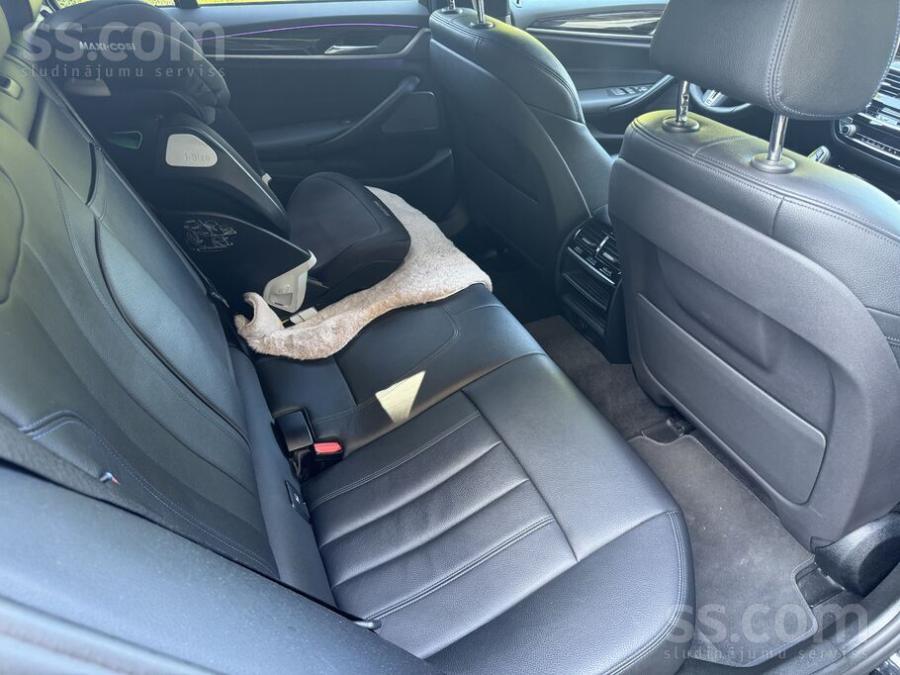 Black BMW 520 2019 in Riga, with an engine capacity of 2.00 L and mileage of 119 thousand km for 26500 €, photo 13 on AUTOMOTO.COM.LV