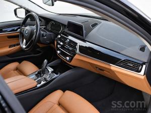 Black BMW 520 2019 in Riga, with an engine capacity of 2.00 L and mileage of 221 thousand km for 18900 €, photo 10 on AUTOMOTO.COM.LV