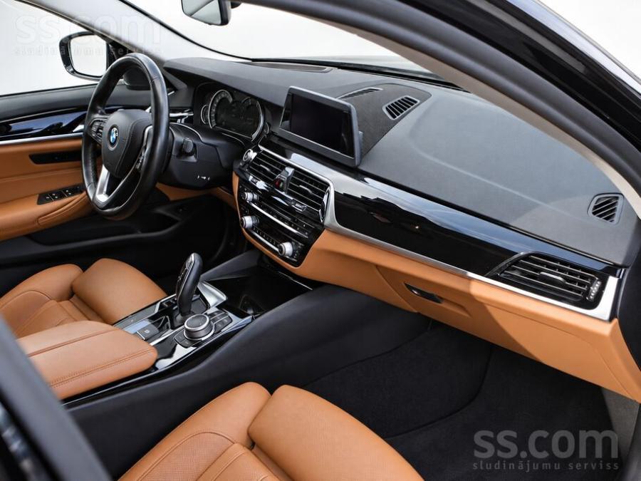 Black BMW 520 2019 in Riga, with an engine capacity of 2.00 L and mileage of 221 thousand km for 18900 €, photo 10 on AUTOMOTO.COM.LV
