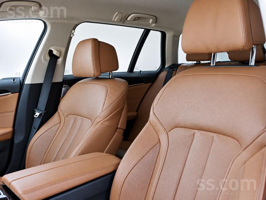 Black BMW 520 2019 in Riga, with an engine capacity of 2.00 L and mileage of 221 thousand km for 18900 €, photo 12 on AUTOMOTO.COM.LV