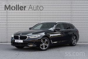Black BMW 520 2020 in Riga, with an engine capacity of 2.00 L and mileage of 153 thousand km for 28950 €, photo 1 on AUTOMOTO.COM.LV