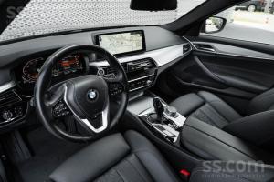 Black BMW 520 2020 in Riga, with an engine capacity of 2.00 L and mileage of 153 thousand km for 28950 €, photo 7 on AUTOMOTO.COM.LV