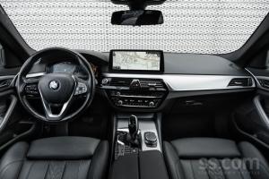 Black BMW 520 2020 in Riga, with an engine capacity of 2.00 L and mileage of 153 thousand km for 28950 €, photo 8 on AUTOMOTO.COM.LV