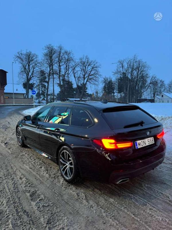 Black BMW 520 2020 in Utena, with an engine capacity of 2.00 L and mileage of 210 thousand km for 27950 €, photo 6 on AUTOMOTO.COM.LV