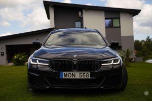 Black BMW 520 2020 in Utena, with an engine capacity of 2.00 L and mileage of 210 thousand km for 27950 €, photo 21 on AUTOMOTO.COM.LV