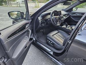 Black BMW 520 2020 in Ogre, with an engine capacity of 2.00 L and mileage of 249 thousand km for 21500 €, photo 4 on AUTOMOTO.COM.LV