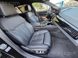 Black BMW 520 2020 in Ogre, with an engine capacity of 2.00 L and mileage of 249 thousand km for 21500 €, photo 6 on AUTOMOTO.COM.LV