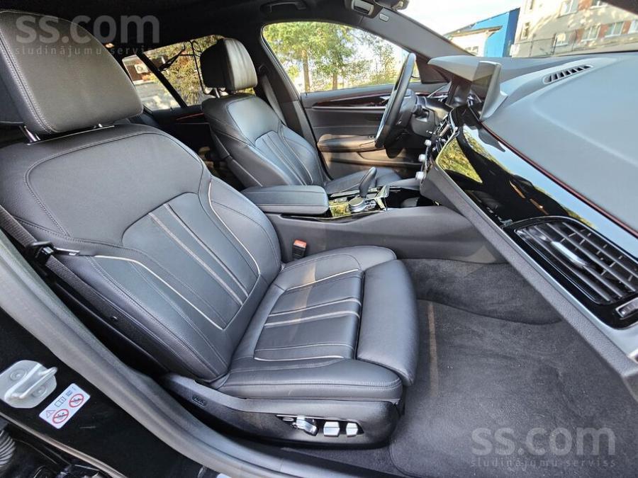 Black BMW 520 2020 in Ogre, with an engine capacity of 2.00 L and mileage of 249 thousand km for 21500 €, photo 6 on AUTOMOTO.COM.LV