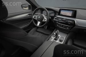 Black BMW 520 2020 in Jelgava, with an engine capacity of 2.00 L and mileage of 311 thousand km for 18500 €, photo 9 on AUTOMOTO.COM.LV