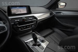 Black BMW 520 2020 in Jelgava, with an engine capacity of 2.00 L and mileage of 311 thousand km for 18500 €, photo 10 on AUTOMOTO.COM.LV