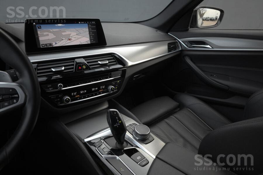 Black BMW 520 2020 in Jelgava, with an engine capacity of 2.00 L and mileage of 311 thousand km for 18500 €, photo 10 on AUTOMOTO.COM.LV