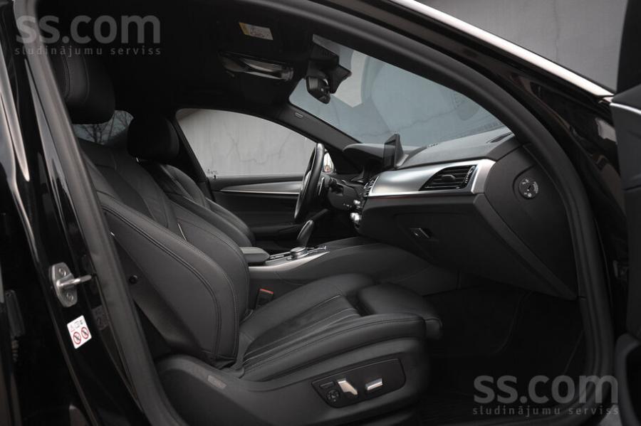 Black BMW 520 2020 in Jelgava, with an engine capacity of 2.00 L and mileage of 311 thousand km for 18500 €, photo 11 on AUTOMOTO.COM.LV