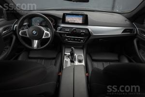 Black BMW 520 2020 in Jelgava, with an engine capacity of 2.00 L and mileage of 311 thousand km for 18500 €, photo 14 on AUTOMOTO.COM.LV