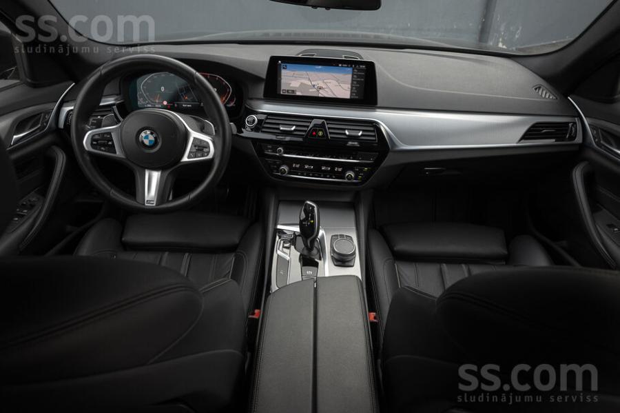 Black BMW 520 2020 in Jelgava, with an engine capacity of 2.00 L and mileage of 311 thousand km for 18500 €, photo 14 on AUTOMOTO.COM.LV
