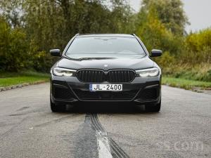 Black BMW 520 2020 in Riga, with an engine capacity of 2.00 L and mileage of 140 thousand km for 27500 €, photo 1 on AUTOMOTO.COM.LV