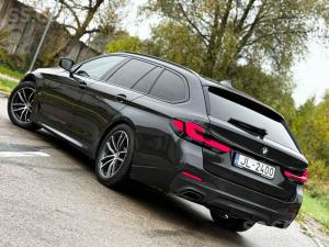 Black BMW 520 2020 in Riga, with an engine capacity of 2.00 L and mileage of 140 thousand km for 27500 €, photo 7 on AUTOMOTO.COM.LV