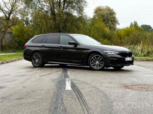 Black BMW 520 2020 in Riga, with an engine capacity of 2.00 L and mileage of 140 thousand km for 27500 €, photo 12 on AUTOMOTO.COM.LV