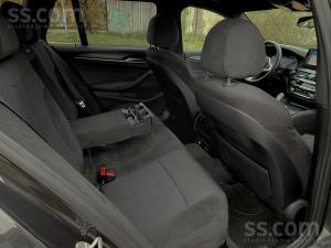 Black BMW 520 2020 in Riga, with an engine capacity of 2.00 L and mileage of 140 thousand km for 27500 €, photo 17 on AUTOMOTO.COM.LV