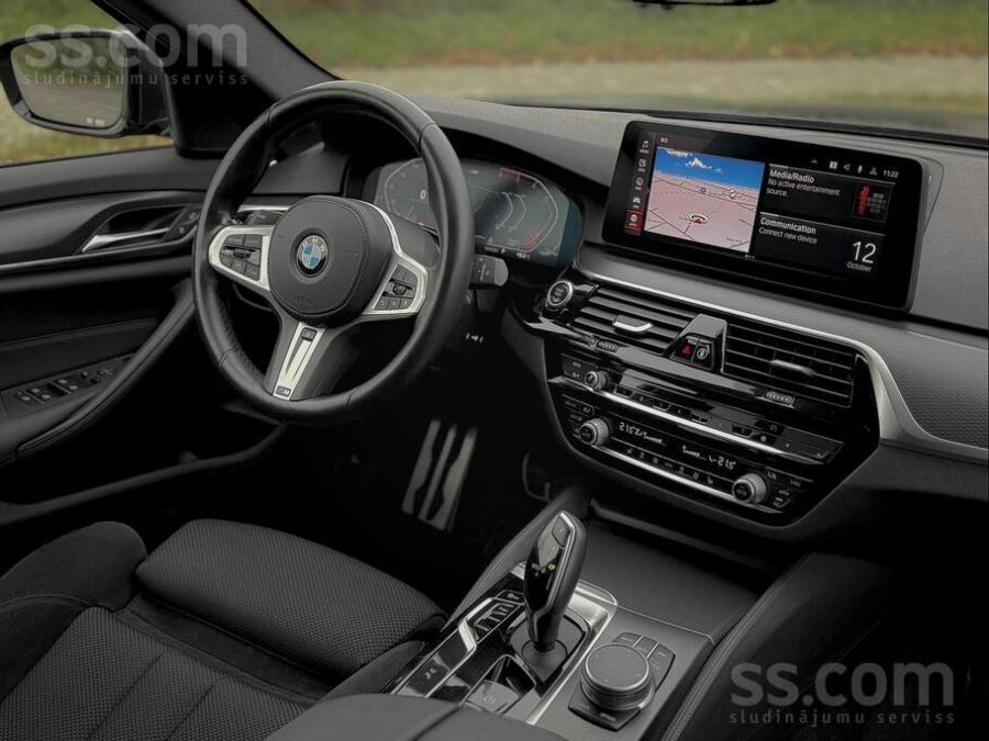 Black BMW 520 2020 in Riga, with an engine capacity of 2.00 L and mileage of 140 thousand km for 27500 €, photo 19 on AUTOMOTO.COM.LV