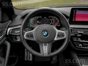 Black BMW 520 2020 in Riga, with an engine capacity of 2.00 L and mileage of 140 thousand km for 27500 €, photo 20 on AUTOMOTO.COM.LV