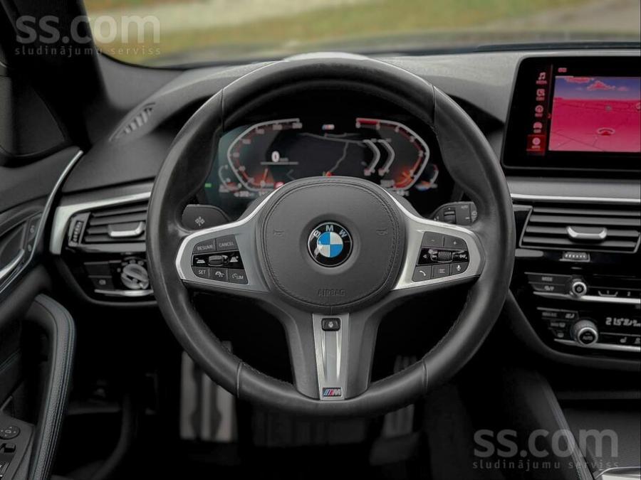 Black BMW 520 2020 in Riga, with an engine capacity of 2.00 L and mileage of 140 thousand km for 27500 €, photo 20 on AUTOMOTO.COM.LV